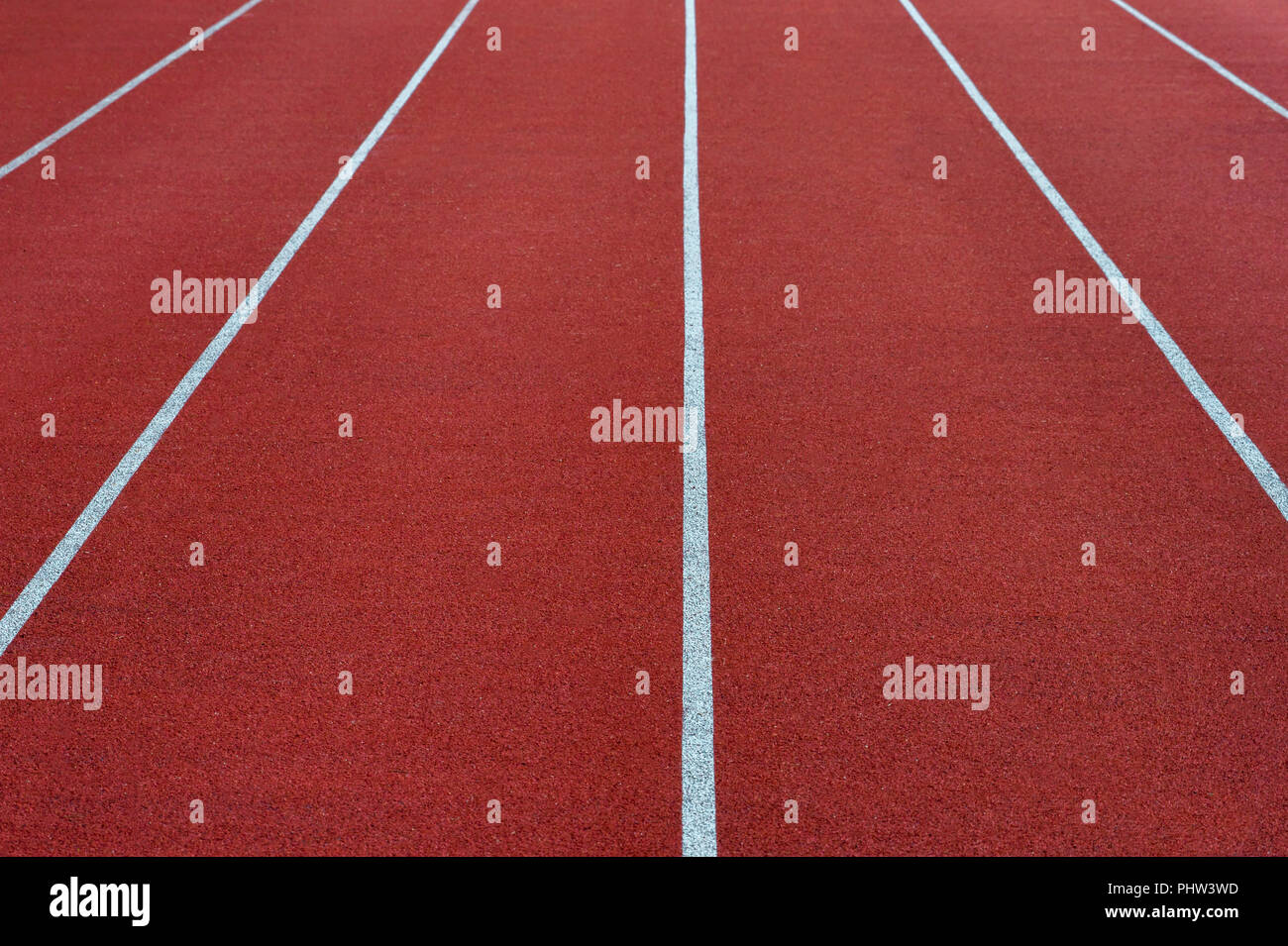 Rubber standard of athletics stadium running track Stock Photo - Alamy