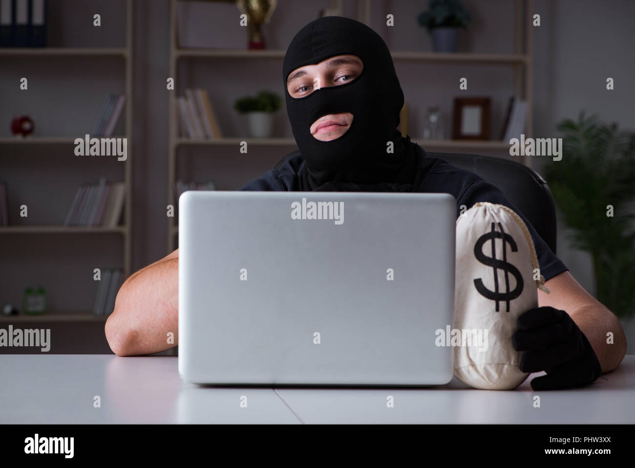 Hacker hacking computer late at night Stock Photo - Alamy