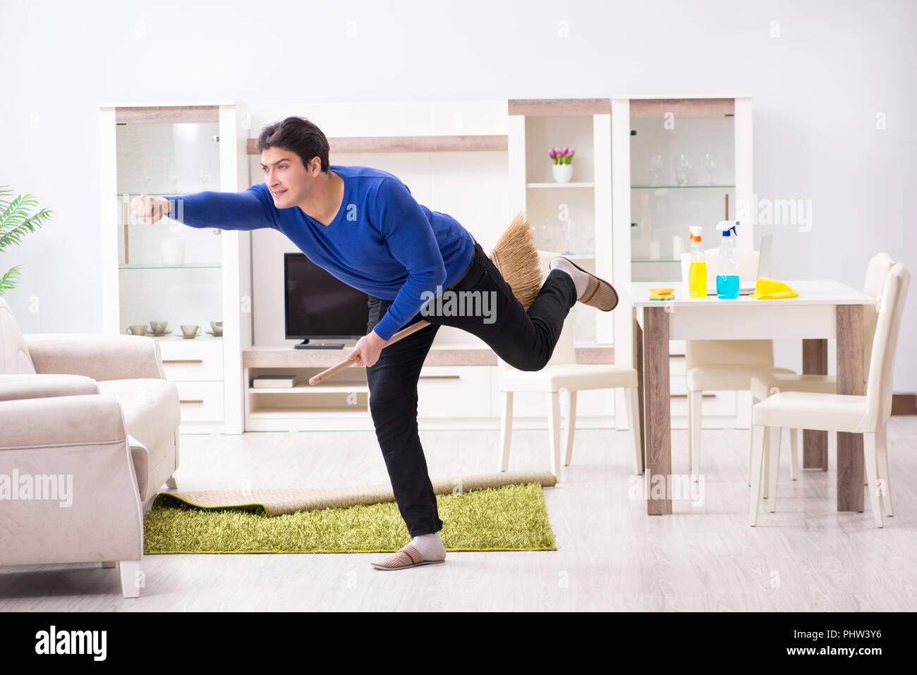 Man flying broomstick hi-res stock photography and images - Alamy