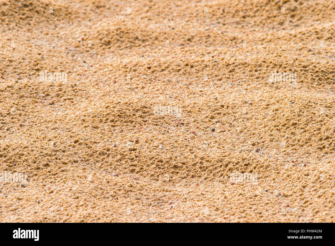 The texture of the sand after the rain Stock Photo - Alamy