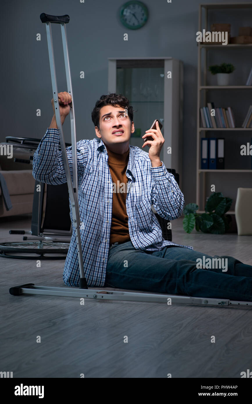 Man falling off chair hi-res stock photography and images - Alamy