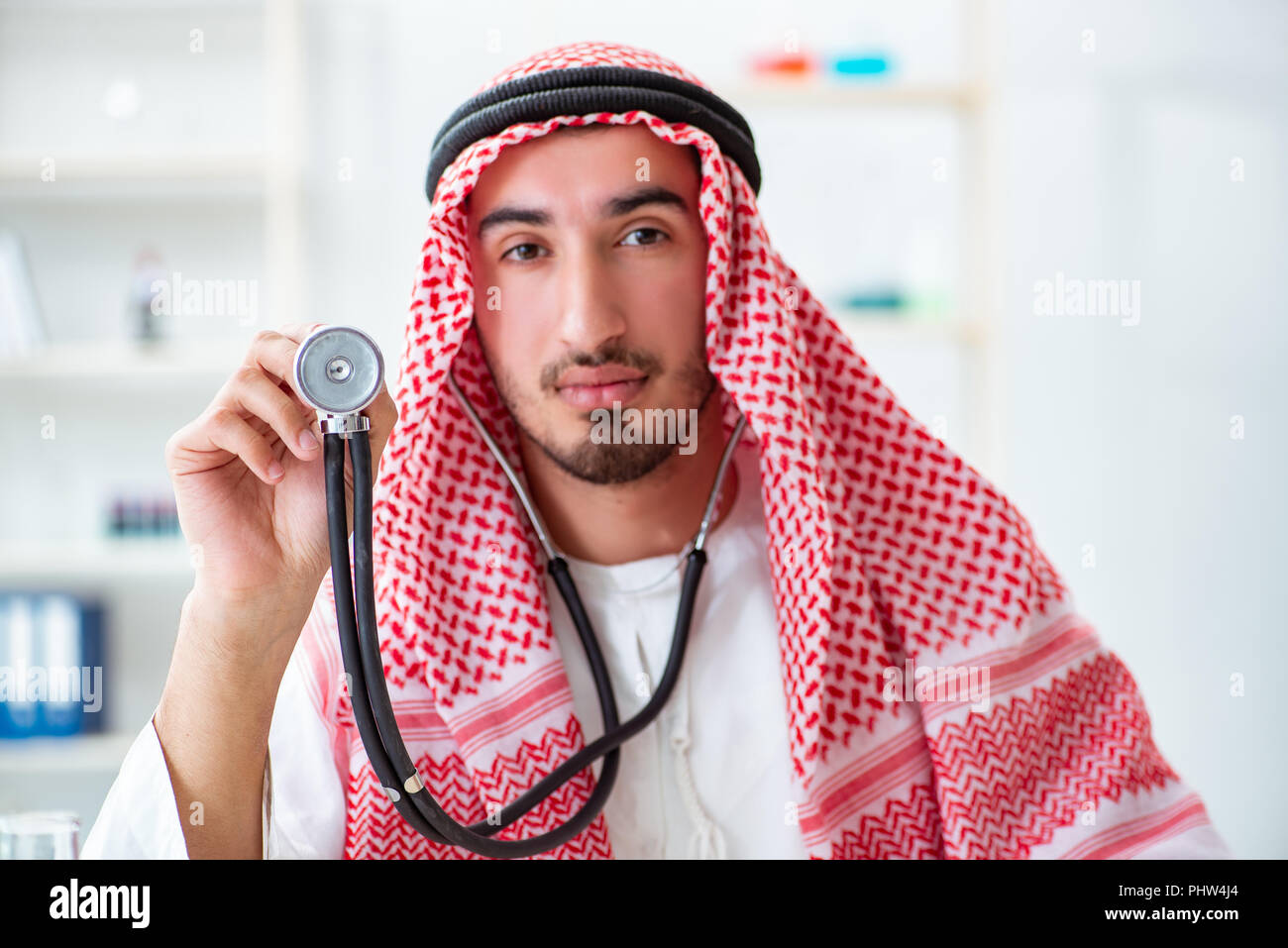 Arab saudi doctor with stethoscope in hospital Stock Photo - Alamy