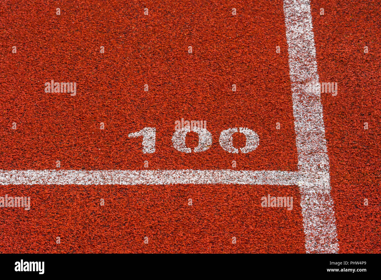 running track rubber standard red color and white line and number 100 ...