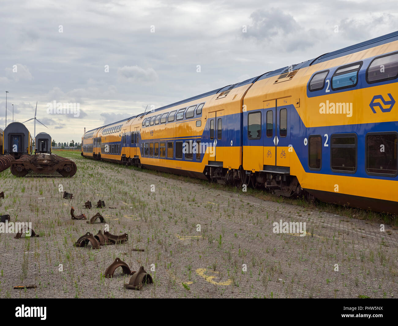 Dual Deck Passenger train carriages lined up on tracks for recycling at ...