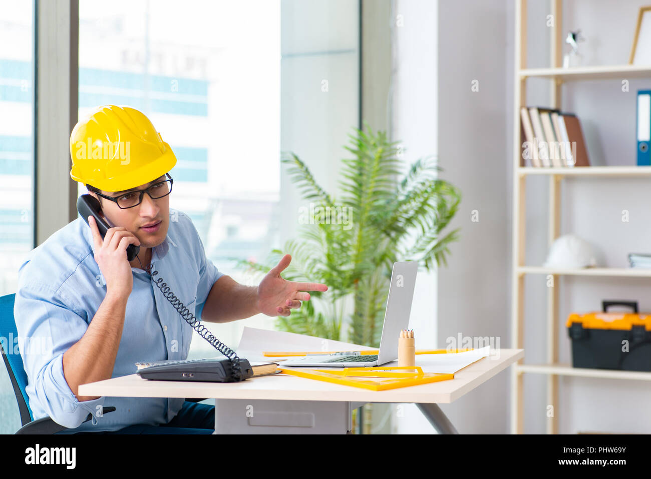 Construction engineer working on new project Stock Photo - Alamy