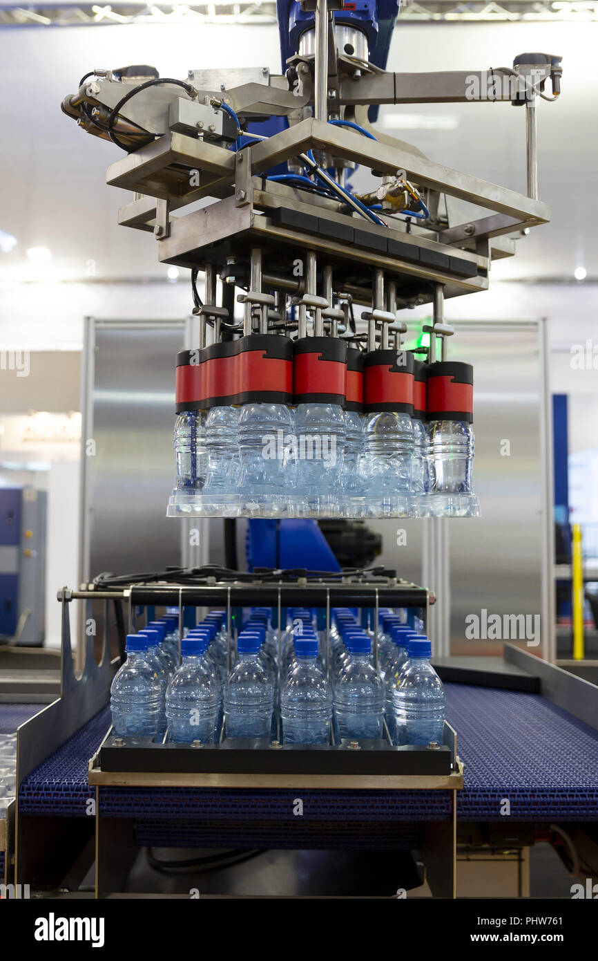 Robotic arm water bottles Stock Photo - Alamy