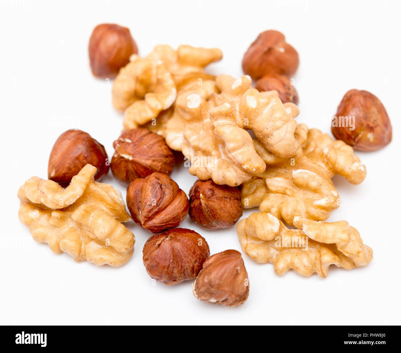 Nuts on white Stock Photo - Alamy