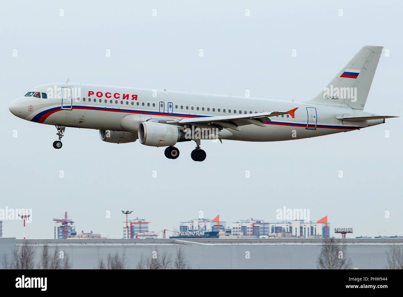 SAINT PETERSBURG, RUSSIA - APRIL 09, 2017: Flying the Airbus A320-214 ...