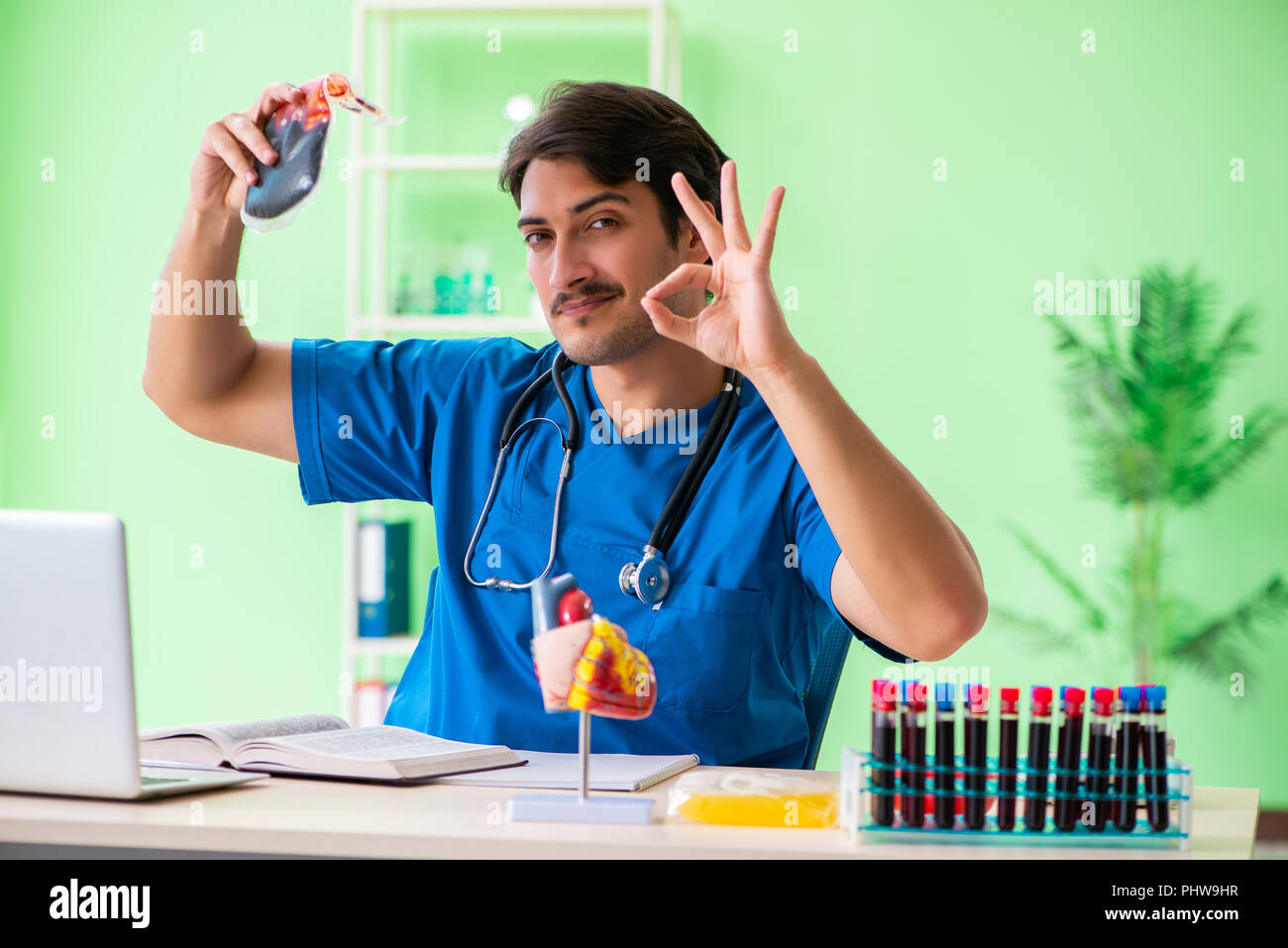 Doctor doing blood analysis in the lab Stock Photo - Alamy
