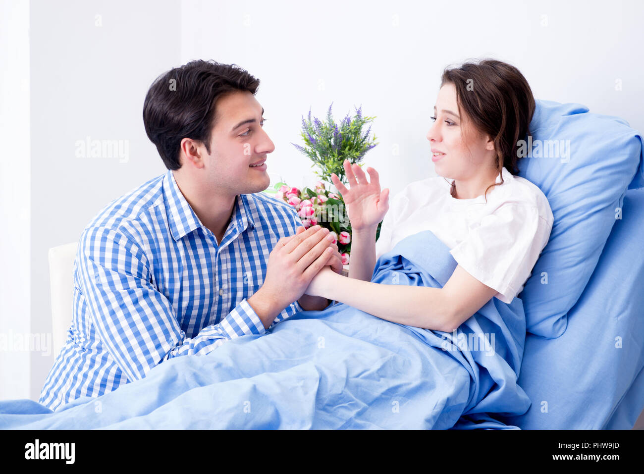 Loving husband caring sick wife hi-res stock photography and images - Alamy