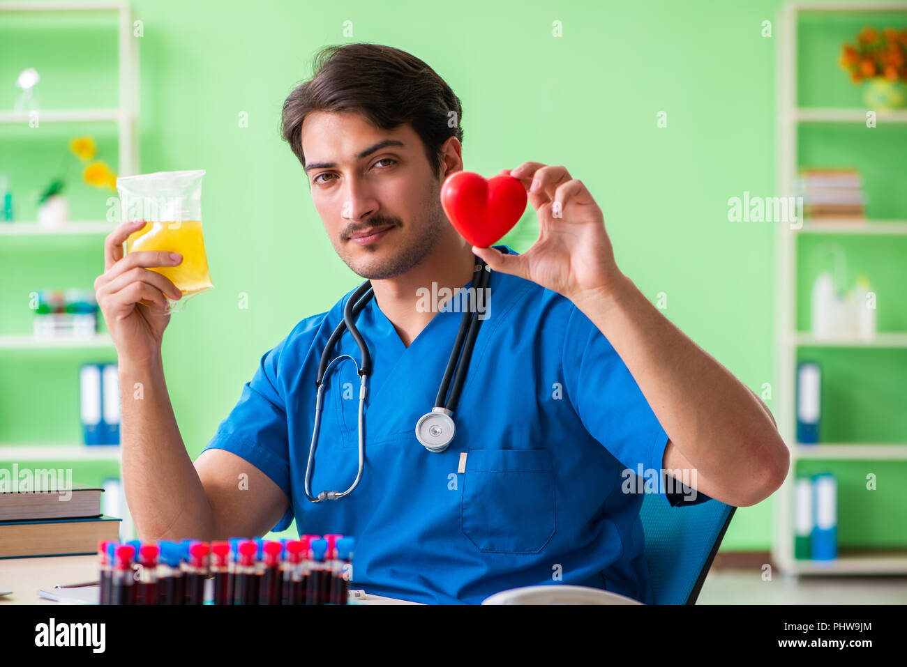 Doctor doing blood analysis in the lab Stock Photo - Alamy