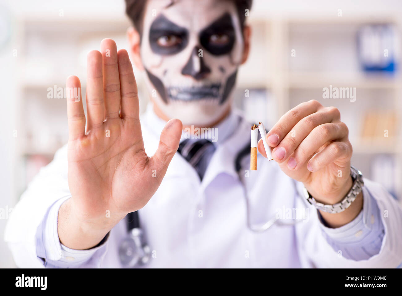 Scary monster doctor working in lab Stock Photo - Alamy