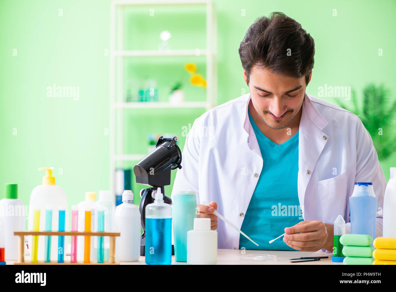 Chemist testing soap in the lab Stock Photo - Alamy