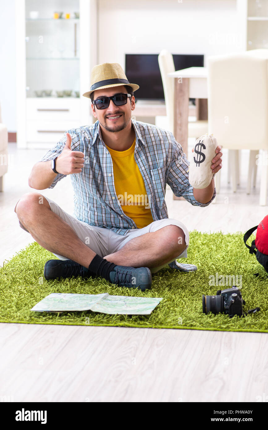 Man planning his travel with map Stock Photo - Alamy