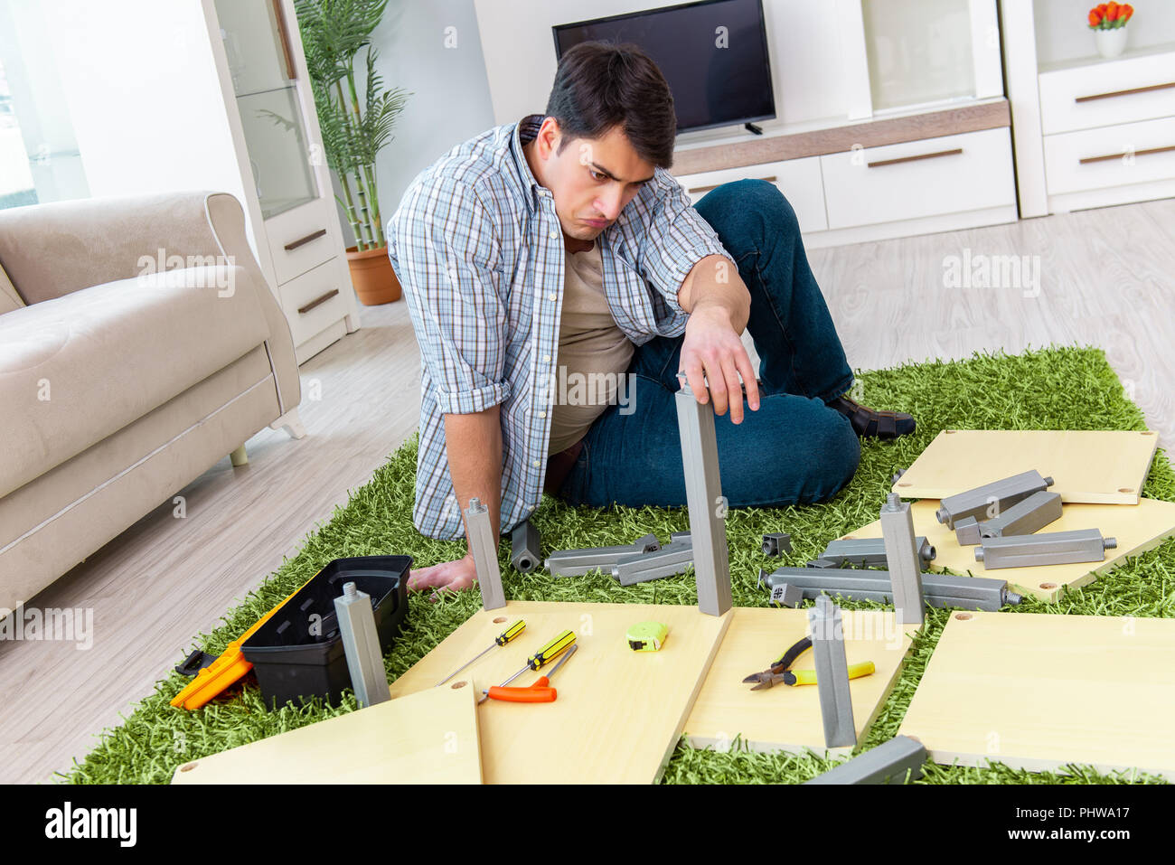 Exhausted home repair man hi-res stock photography and images - Alamy