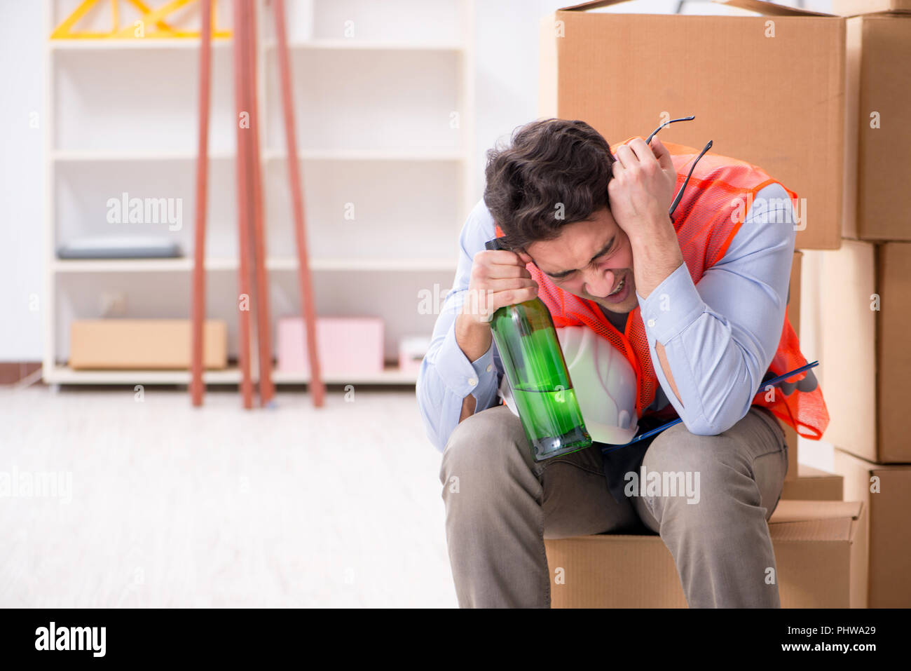 Delivery man drunk at work Stock Photo - Alamy
