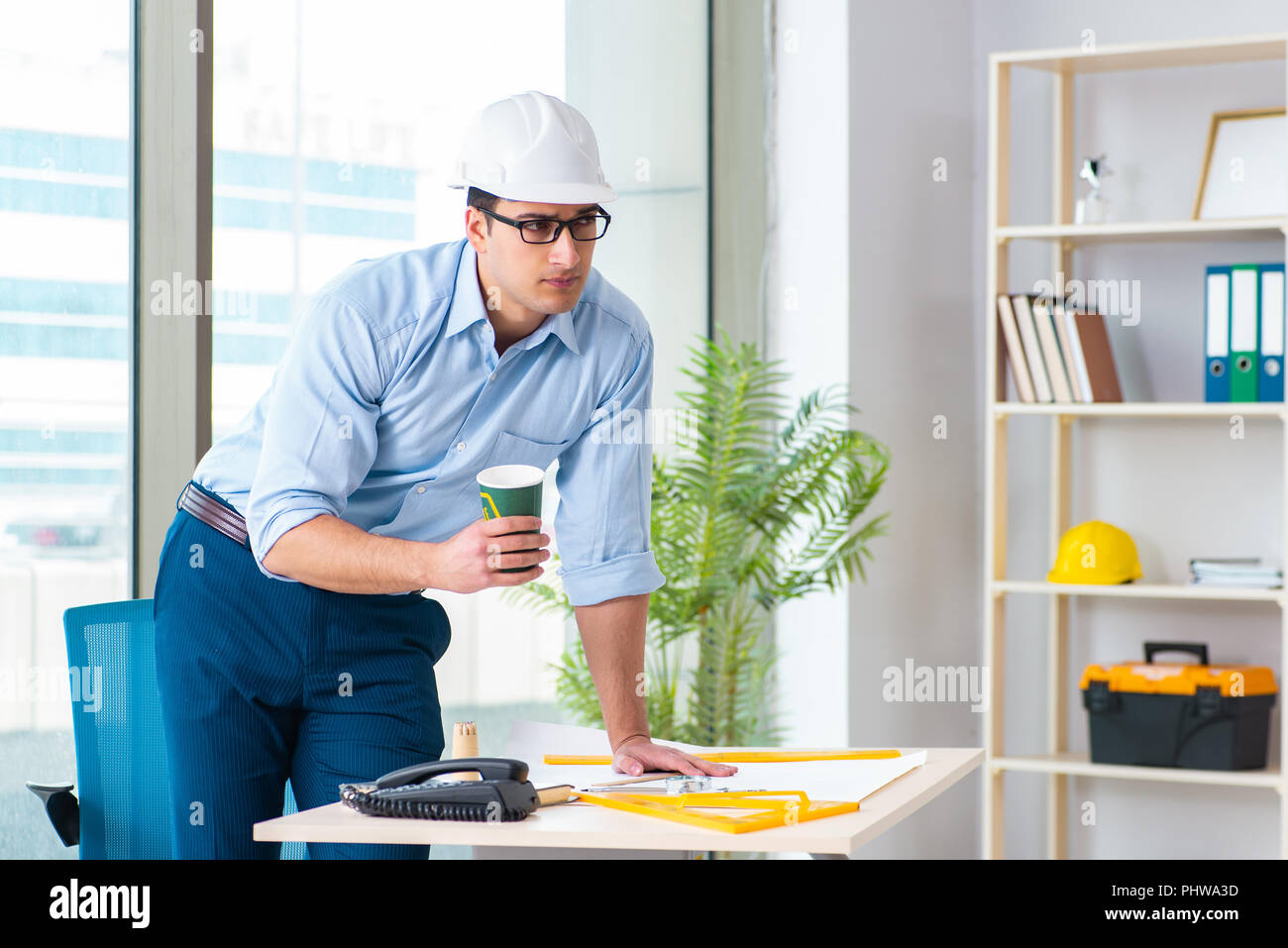Construction engineer working on new project Stock Photo - Alamy