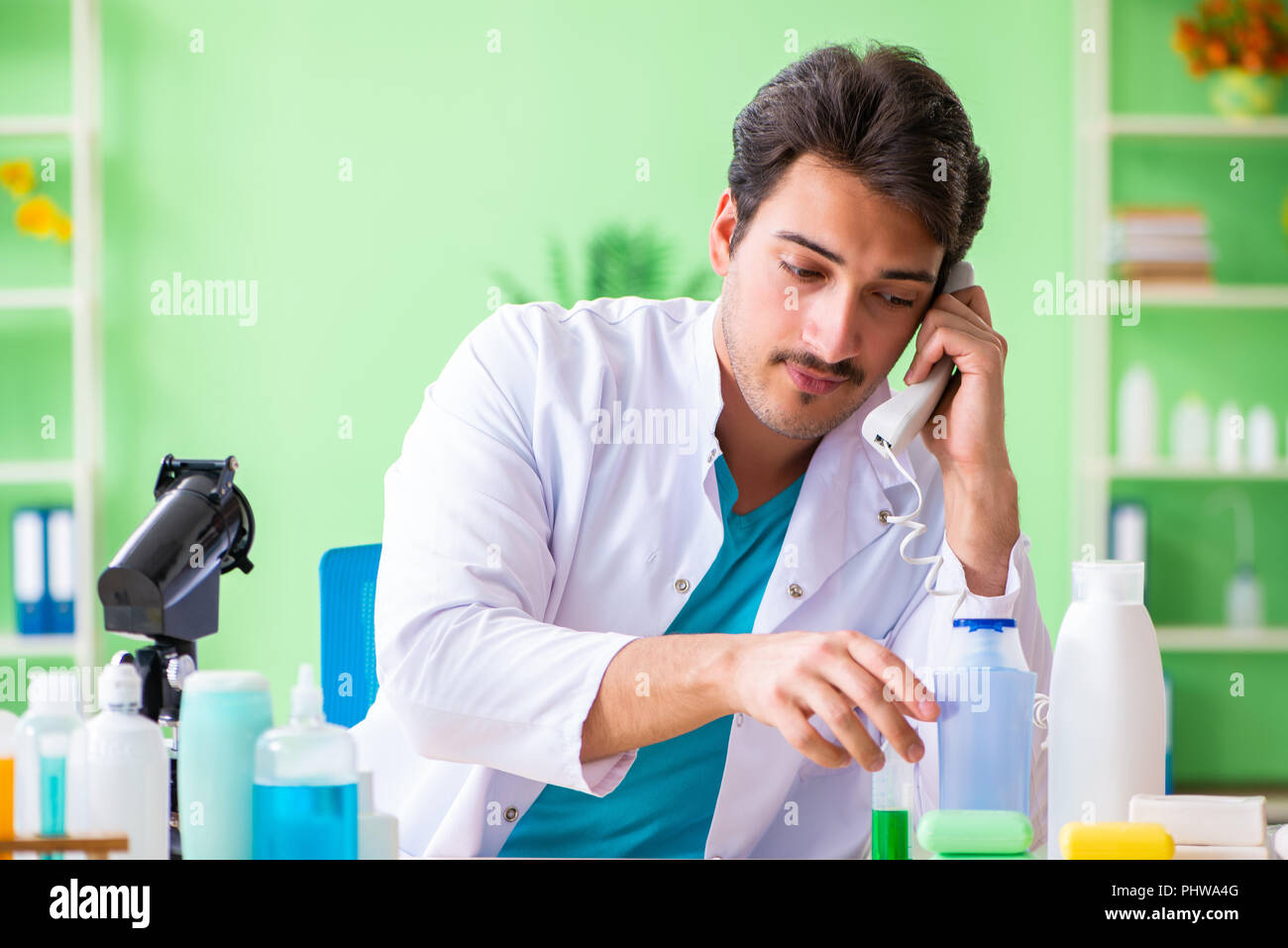 Chemist testing soap in the lab Stock Photo - Alamy