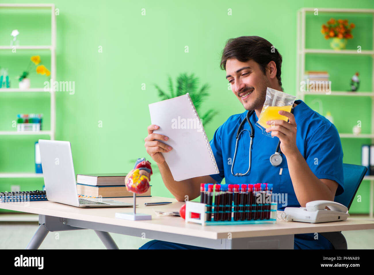 Doctor doing blood analysis in the lab Stock Photo - Alamy