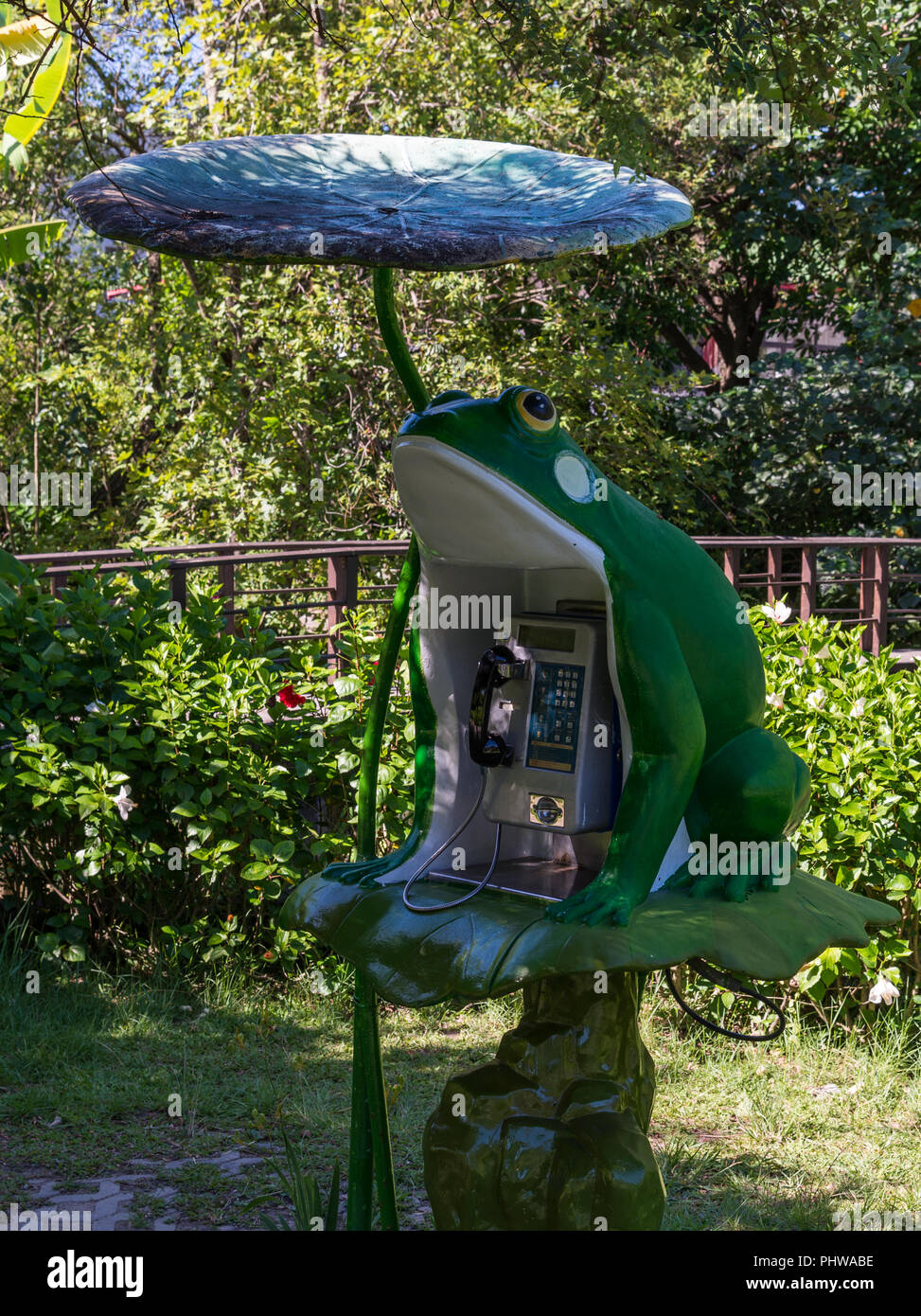 A payphone decorated with a green frog. Taipei Botanical Garden. Taipei ...