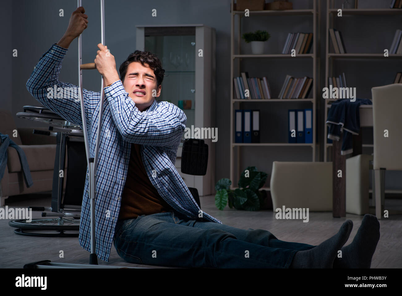 Man Falling Off Chair High Resolution Stock Photography and Images - Alamy