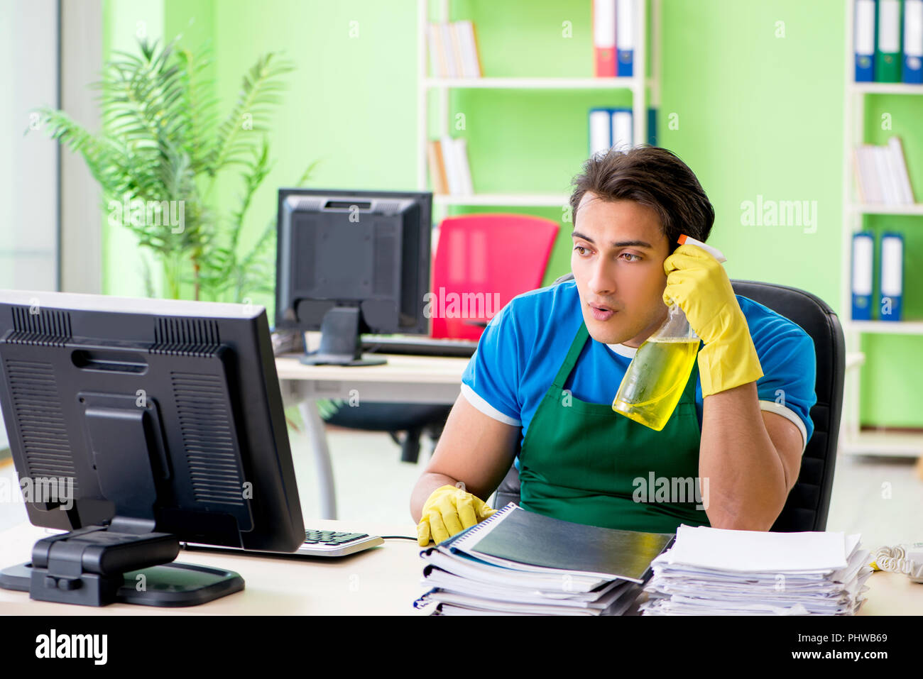 Hacker under professional cleaner cover stealing personal data Stock ...