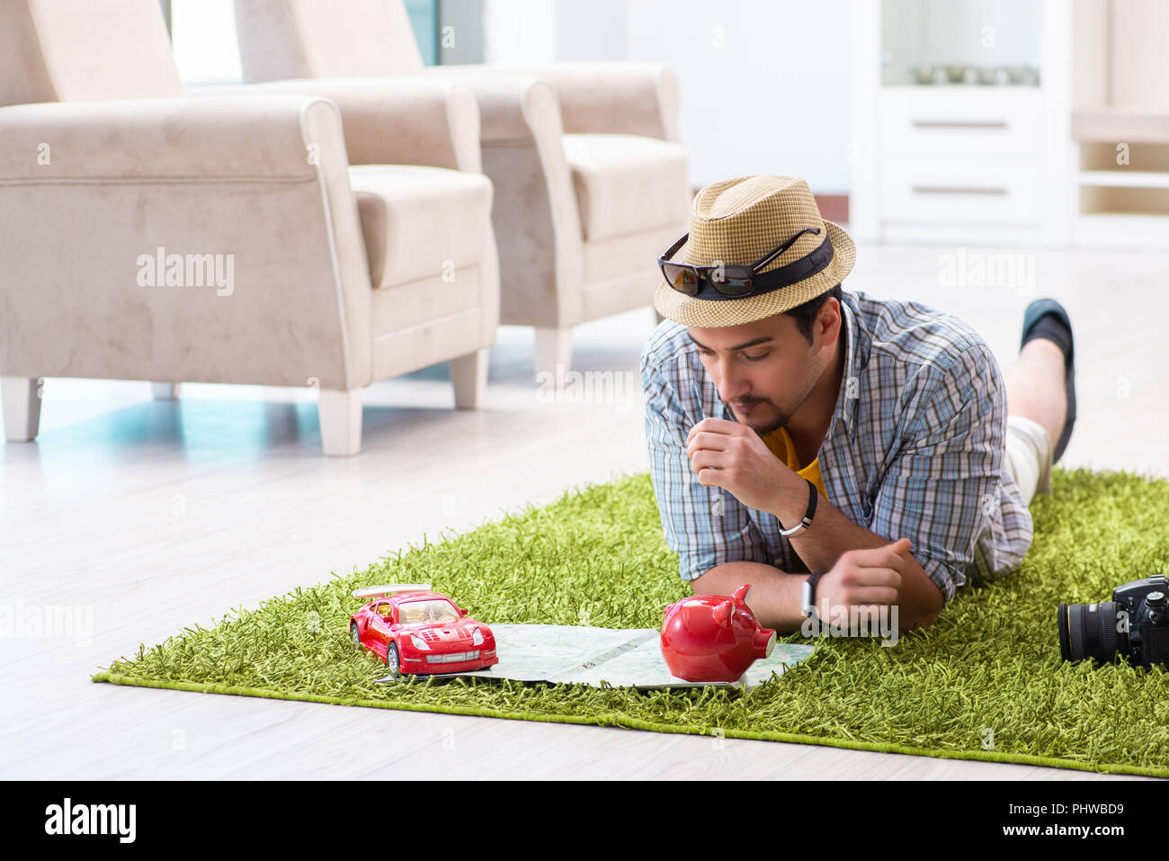 Man planning his travel with map Stock Photo - Alamy