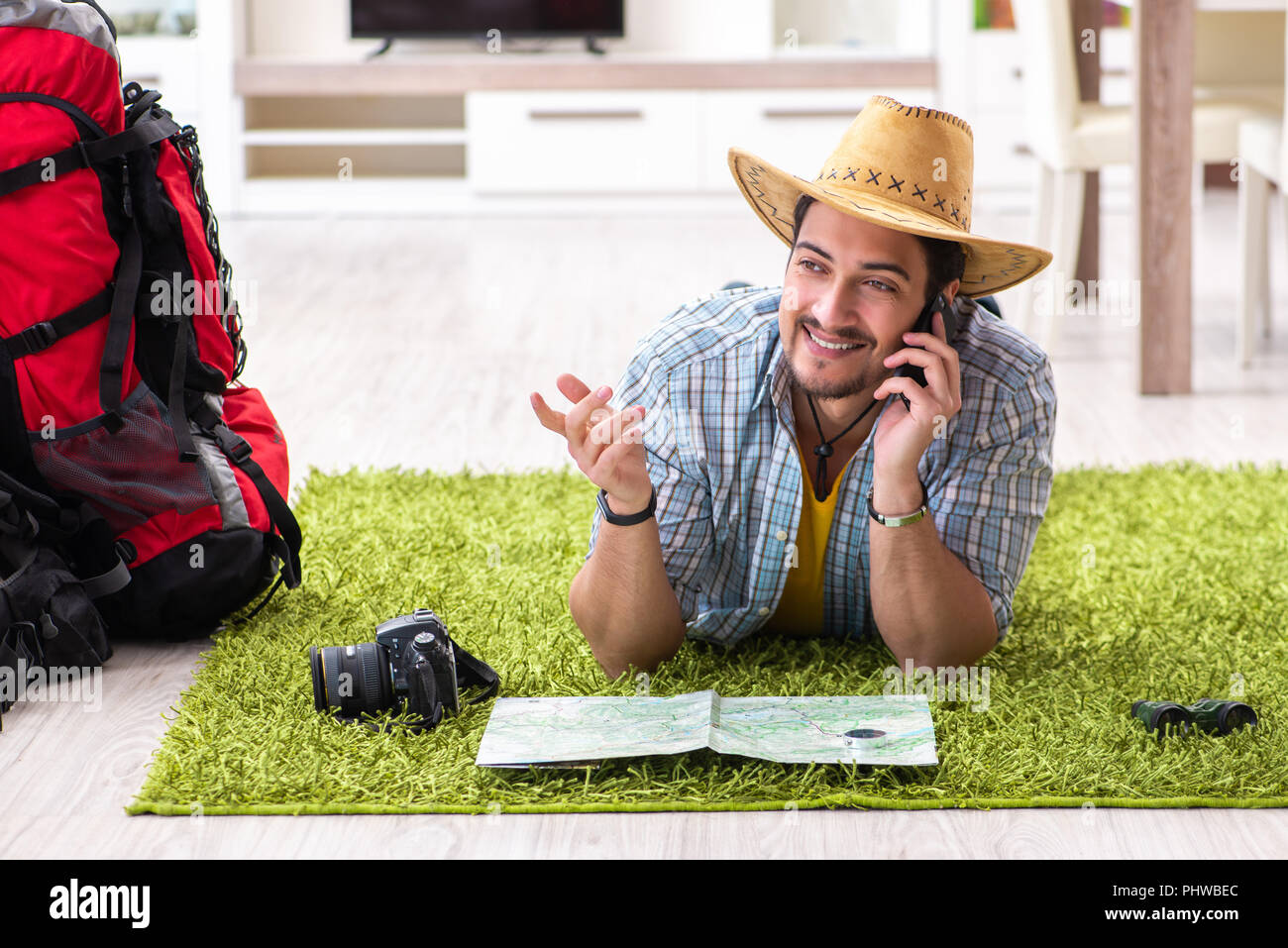 Man planning his travel with map Stock Photo - Alamy