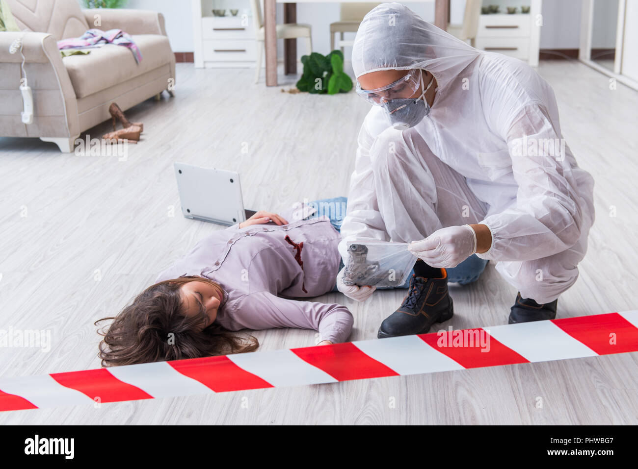 Forensic Investigator At The Crime Scene Investigating Woman Mur Stock