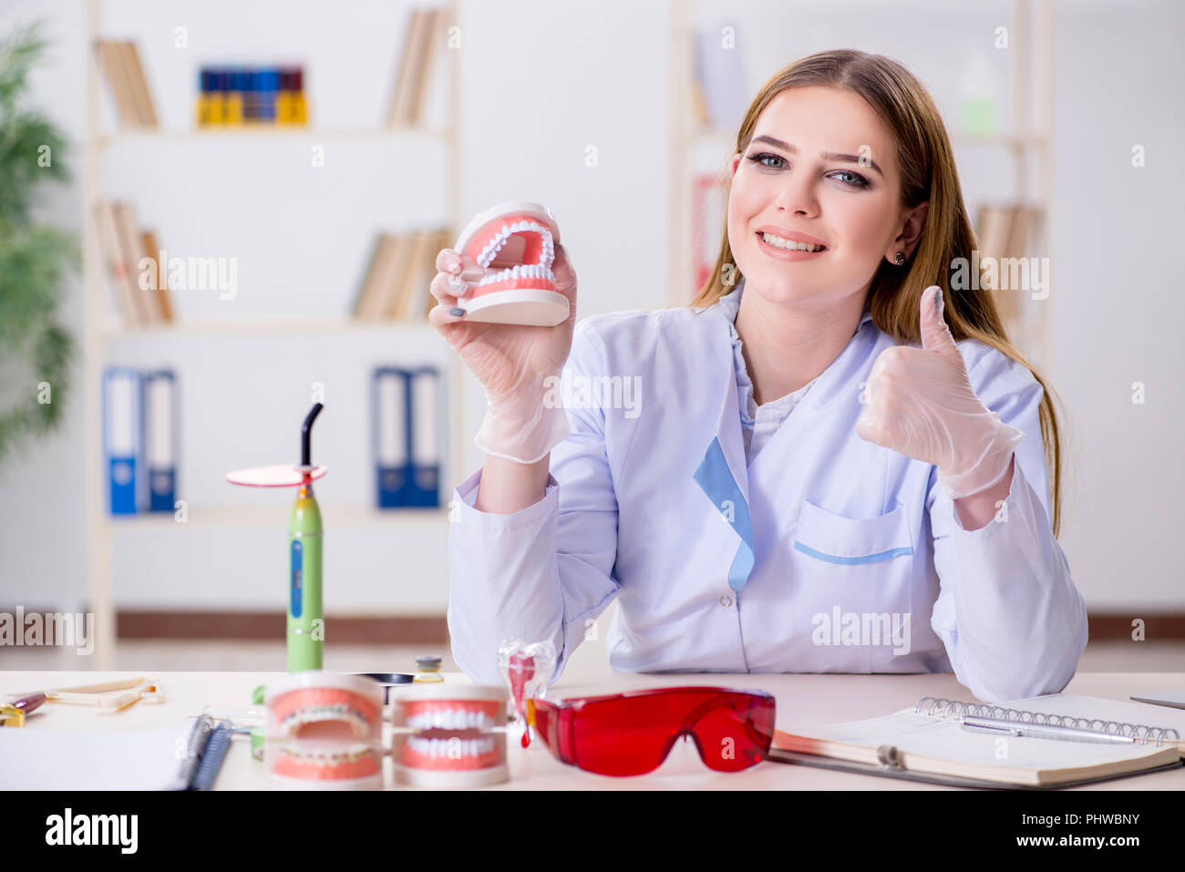 Dentistry student practicing skills in classroom Stock Photo - Alamy