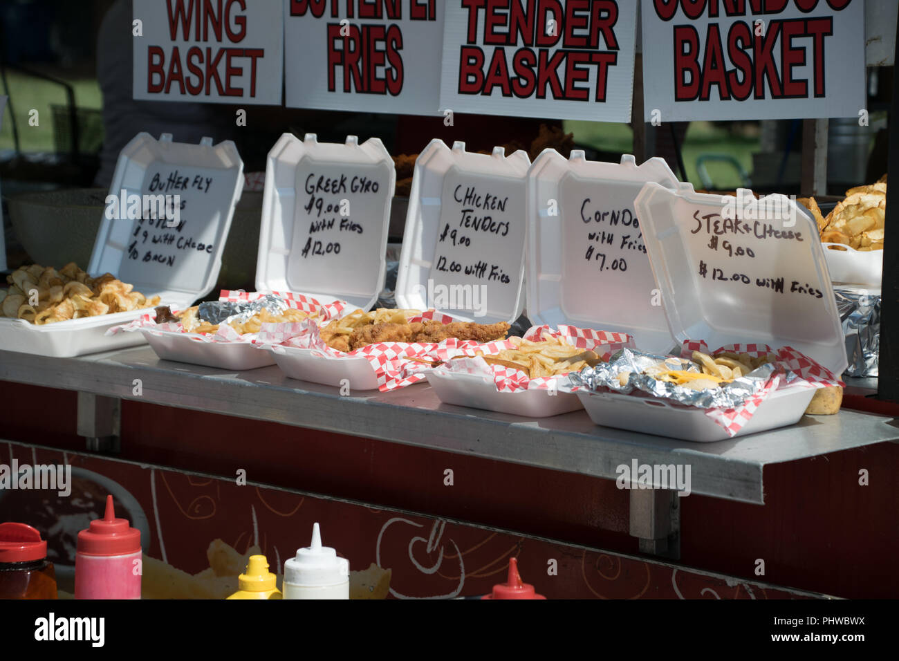 Visual menu display for a food vendor at a street fair on Labor Day ...