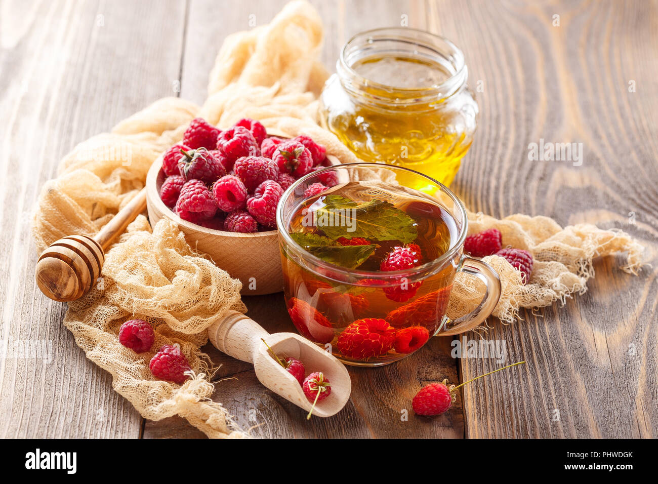 Tea with mint and raspberry Stock Photo - Alamy
