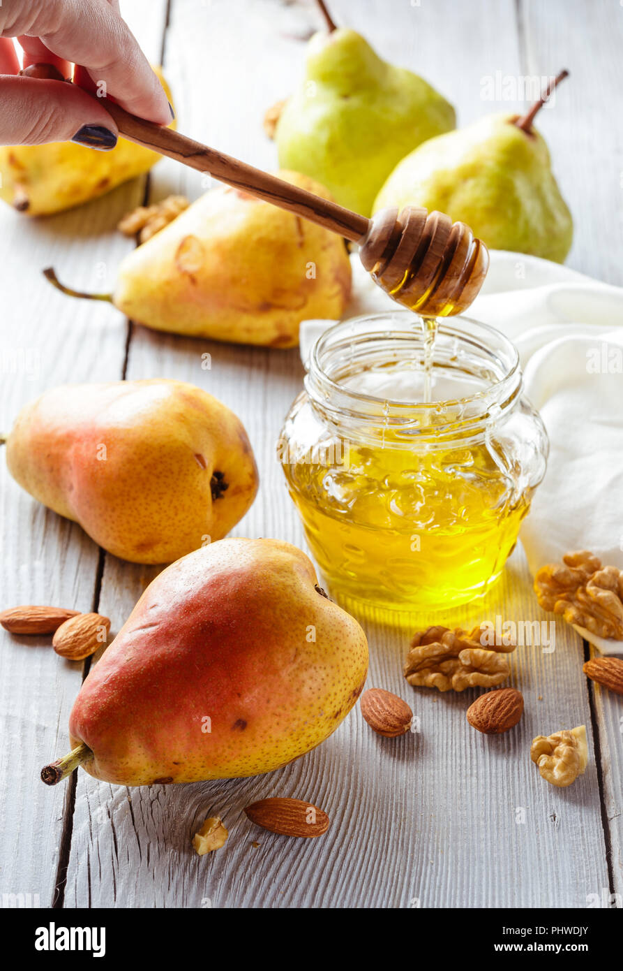 Pears with honey Stock Photo - Alamy