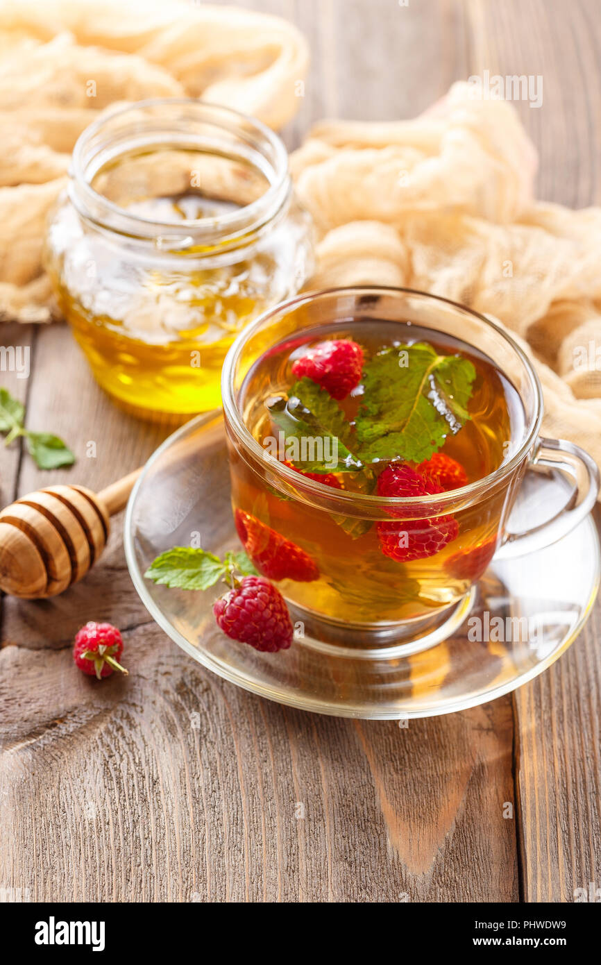 Tea with mint and raspberry Stock Photo - Alamy