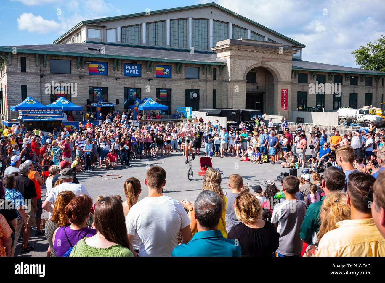 A juggler performs for a crowd at The Great New York State Fair ...