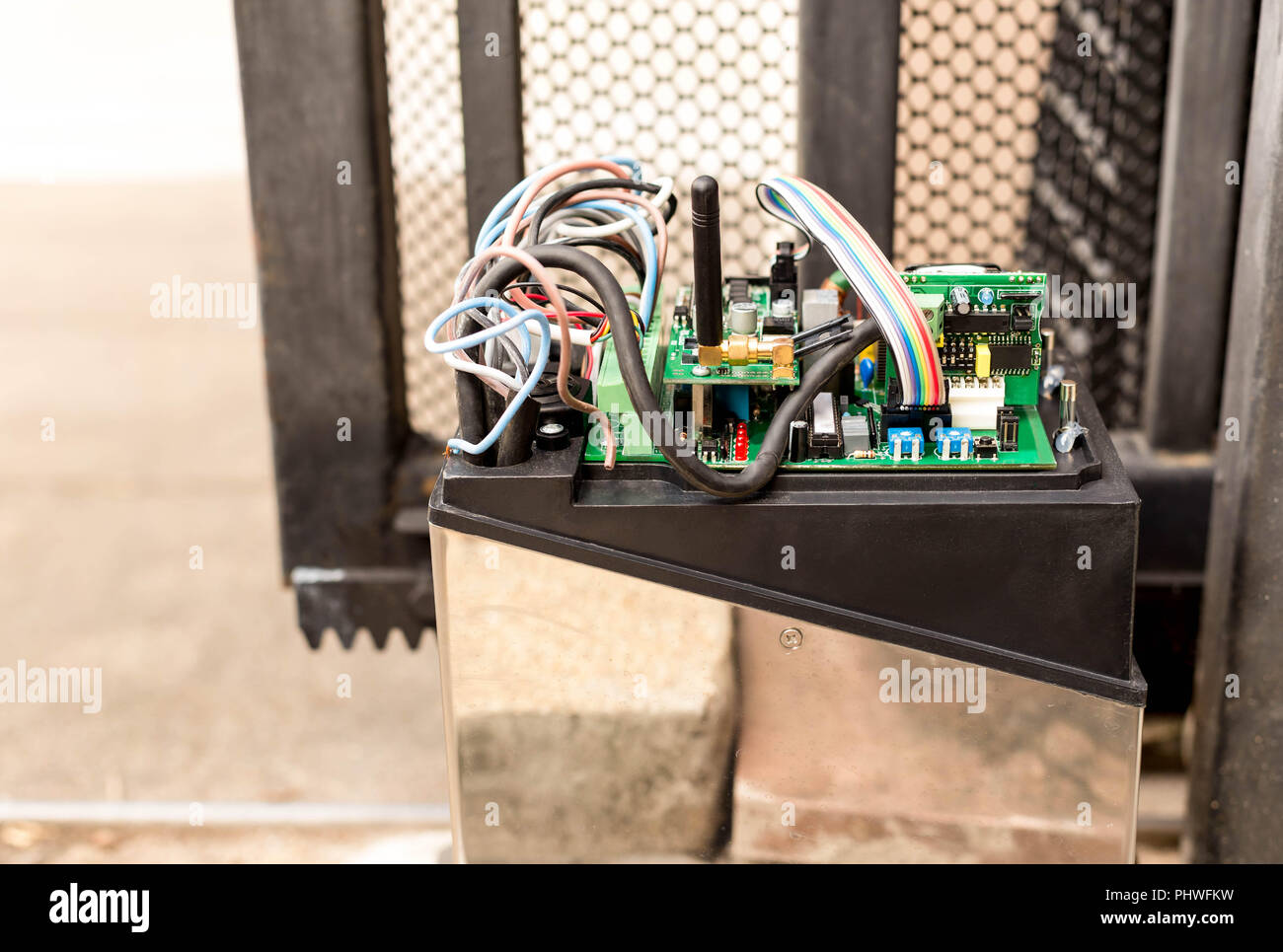 Electronic Gate control system motor with wires industrial Stock Photo ...