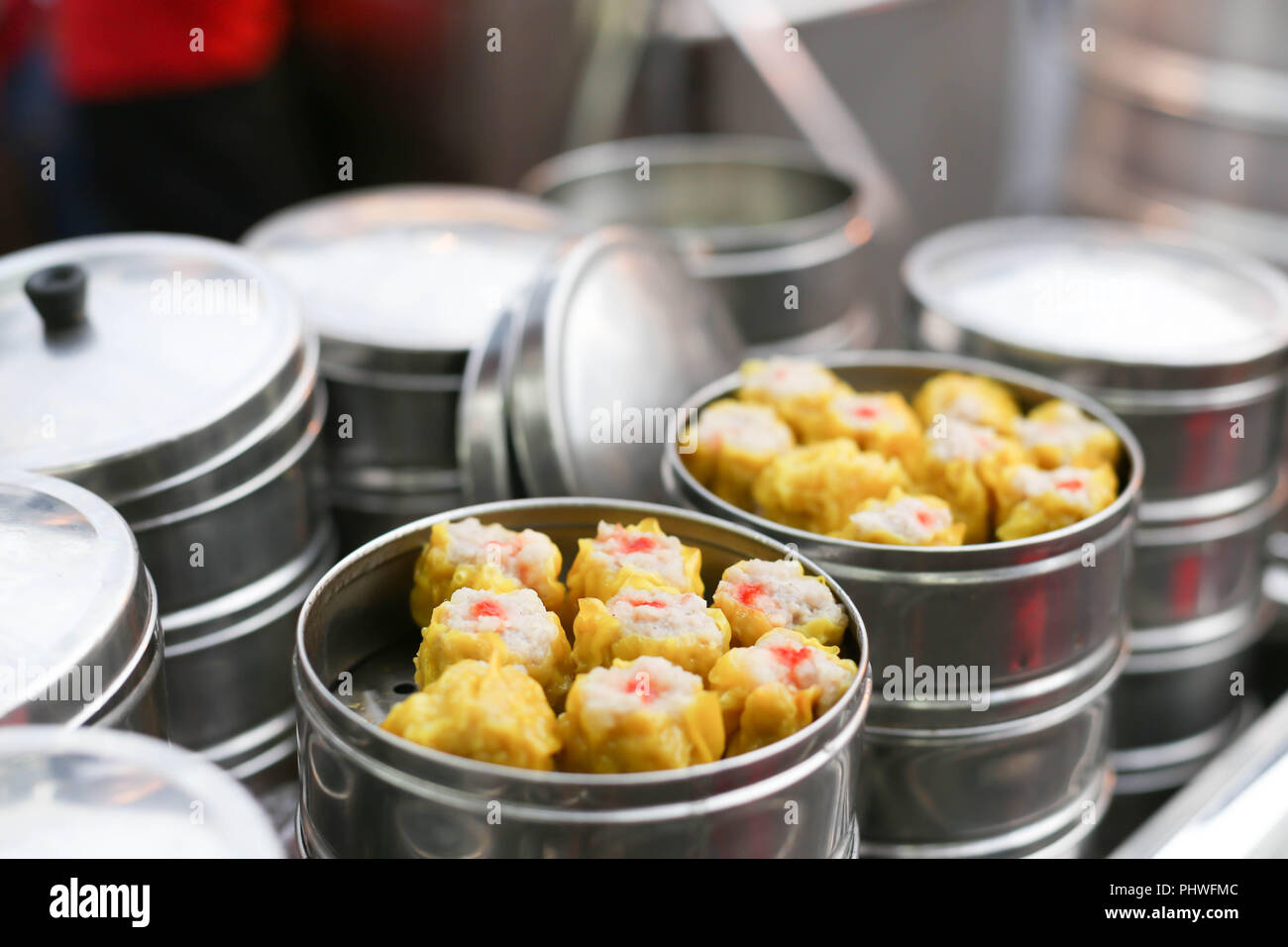 Chinese dumplings in steam bamboo basket Stock Photo - Alamy