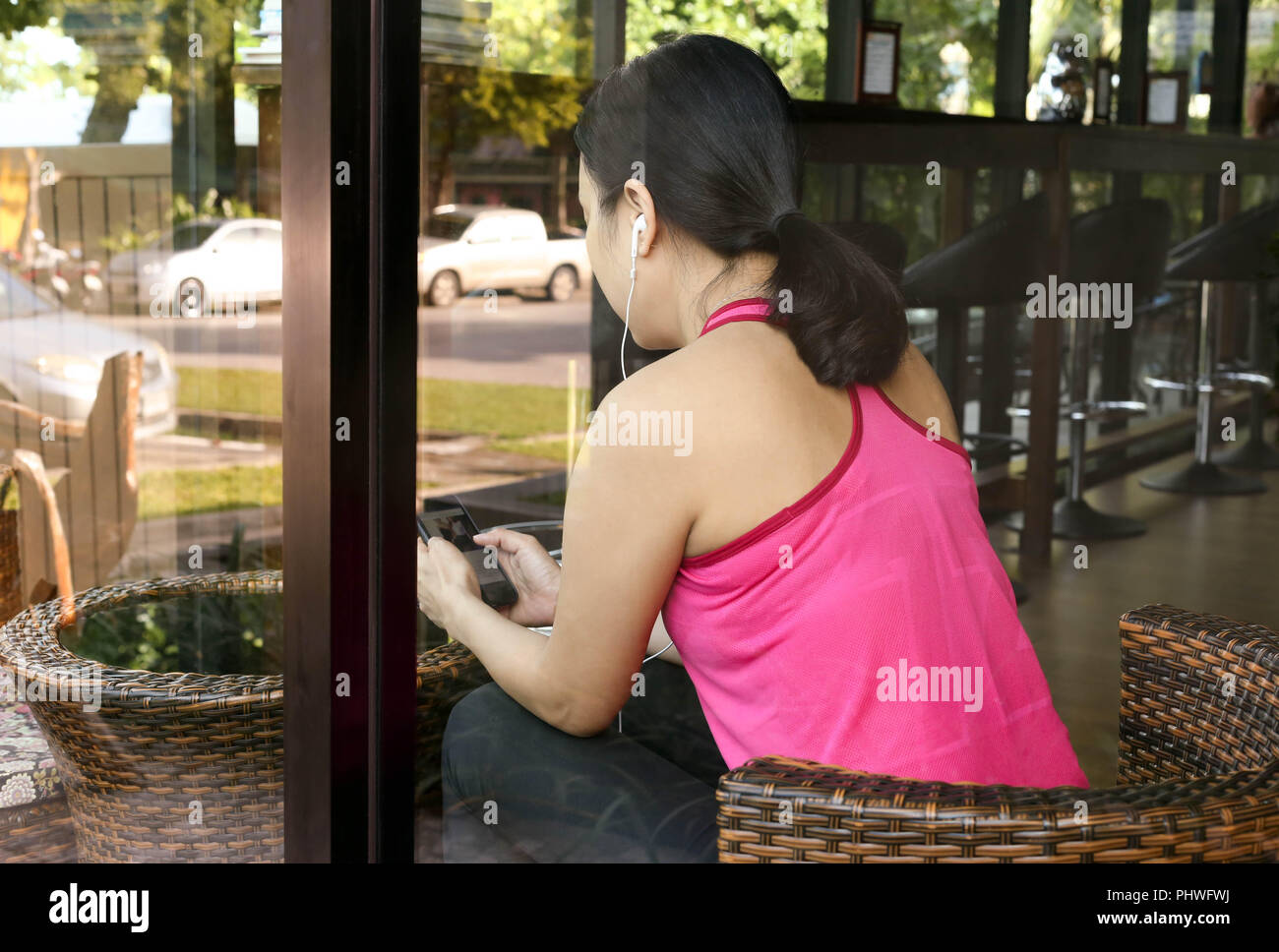 Serious phone woman relax hi-res stock photography and images - Alamy