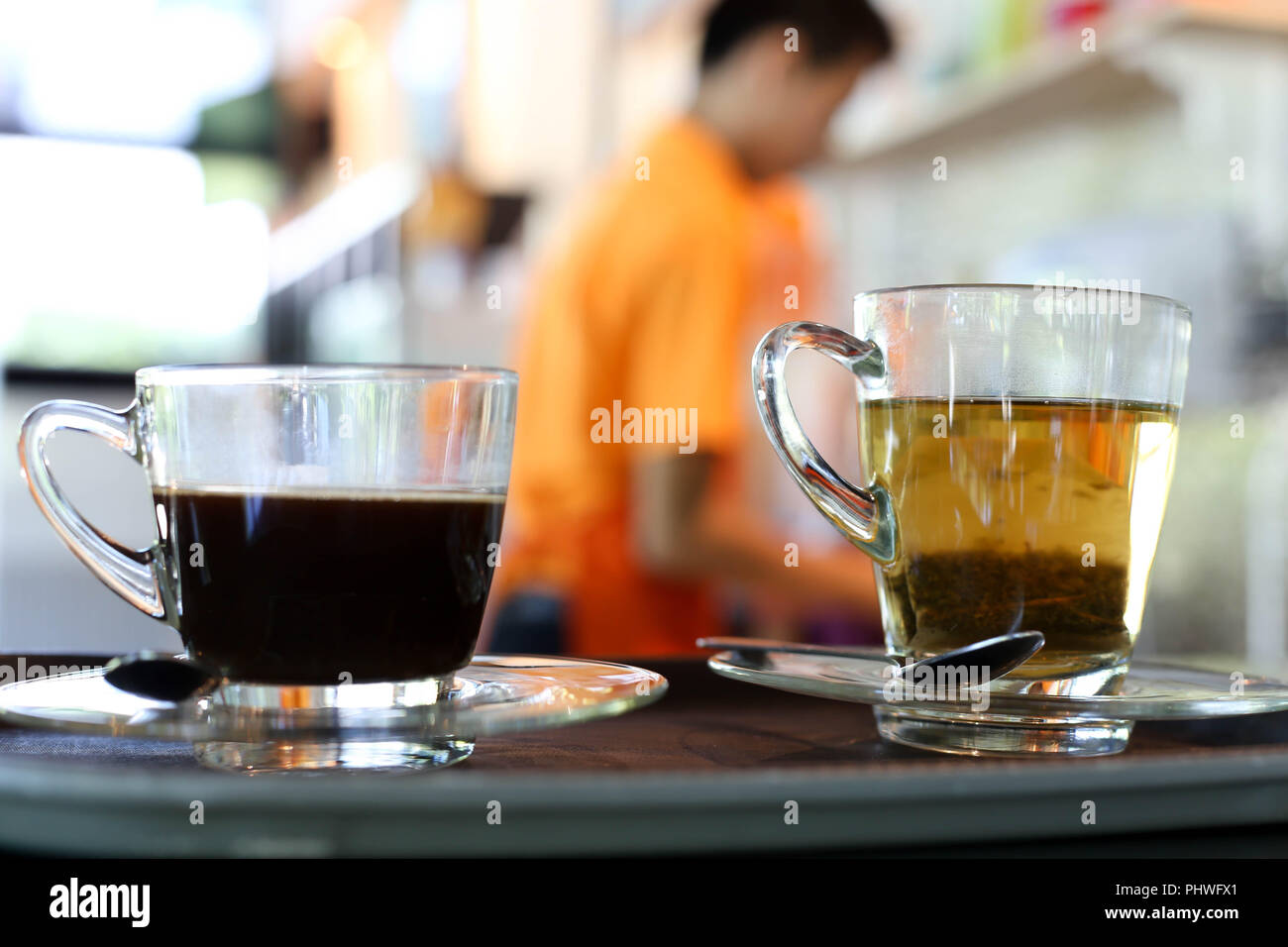 Cups of tea and cups of coffee on the tray in a cafe shop Stock Photo ...