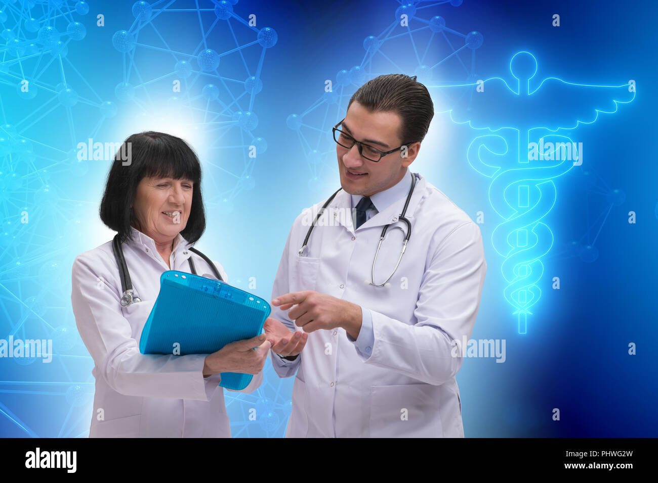 Two doctors discussing patient mri hi-res stock photography and images ...