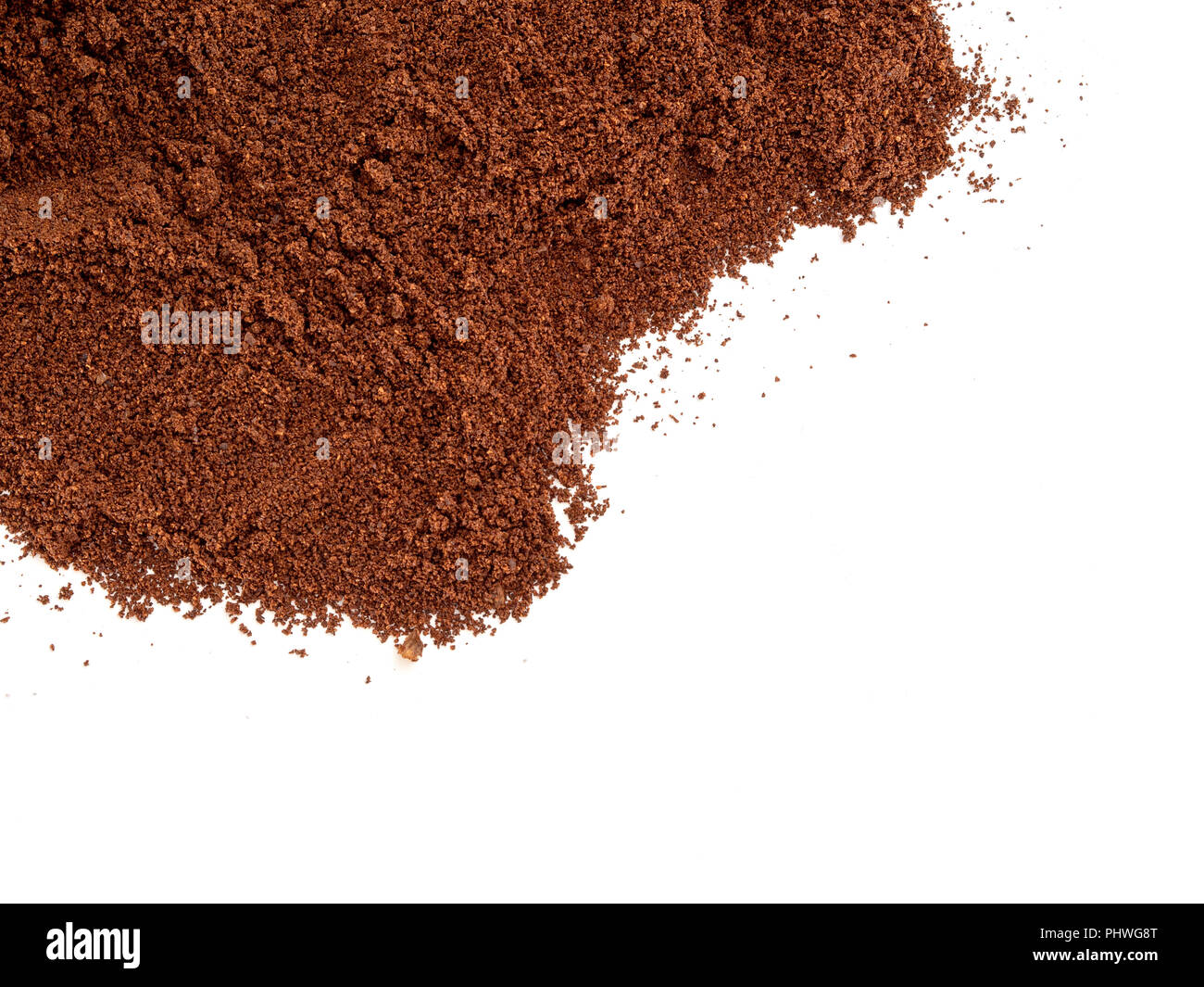 Ground roasted coffee, spilled and isolated on white Stock Photo - Alamy