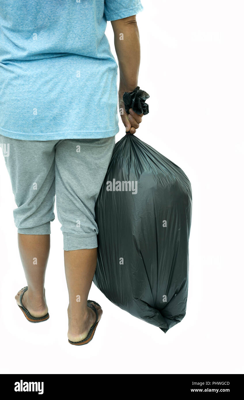 Woman carrying garbage bag hi-res stock photography and images - Alamy