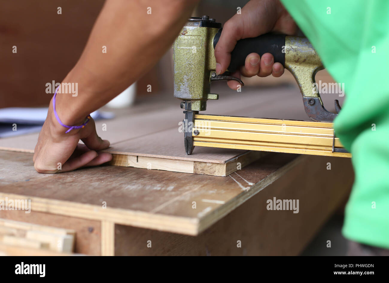 Carpenter used a nail gun Stock Photo - Alamy
