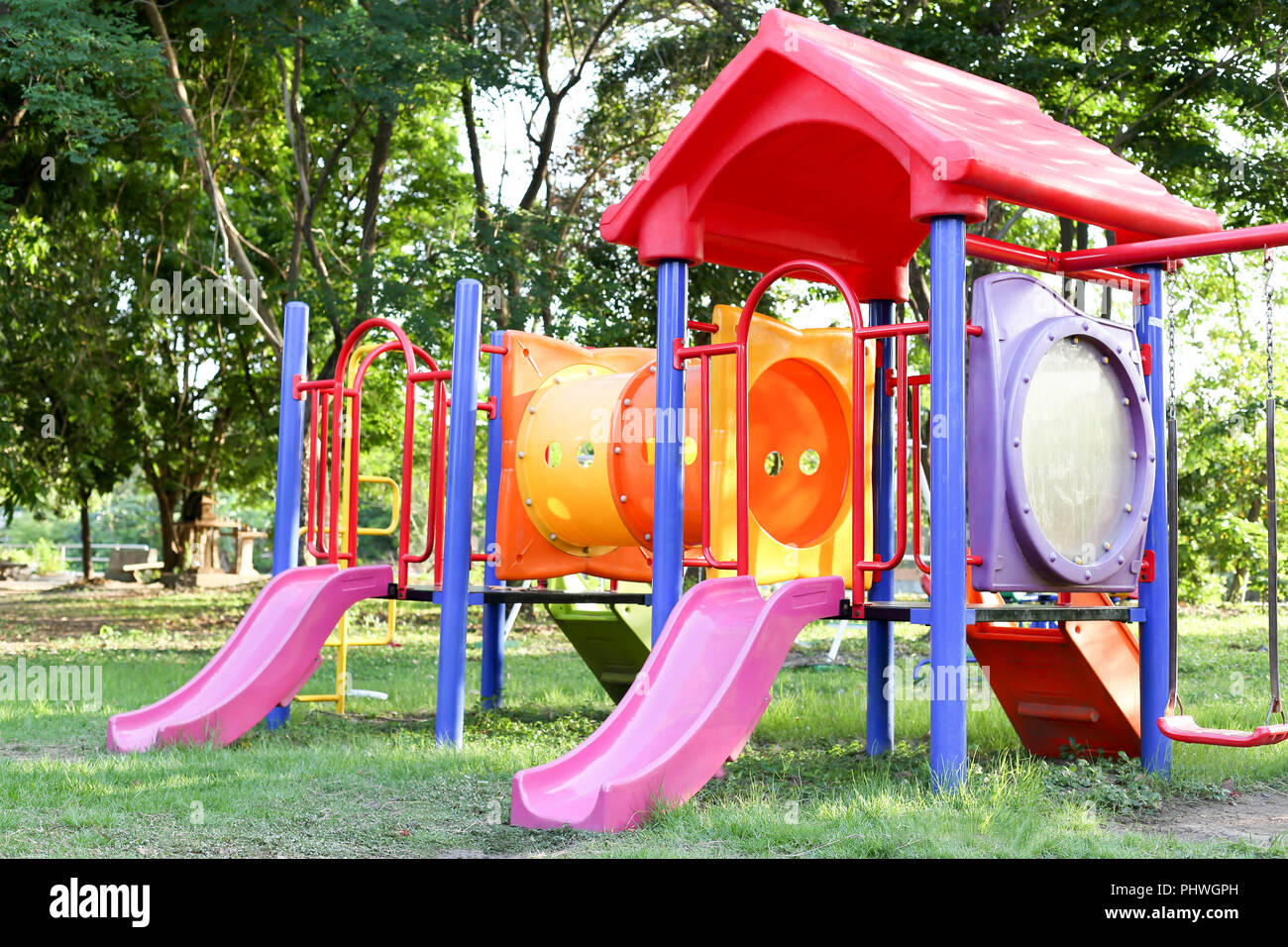 Colorful children play ground in park Stock Photo - Alamy
