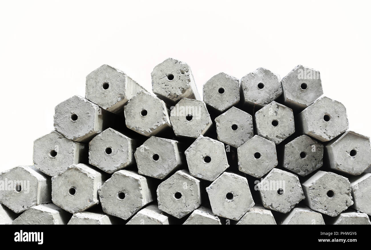 The pile of hexagon concrete foundation piles isolated Stock Photo - Alamy