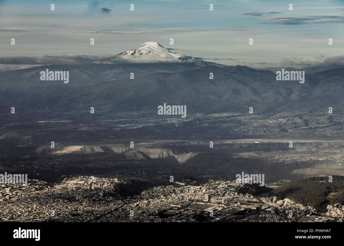 Aerial view of Quito and Antisana volcano in Quito, Ecuador, South ...