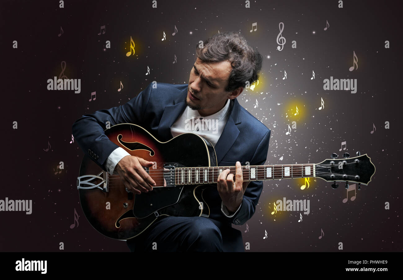 Young guitarist with falling musical notes wallpaper and classical ...