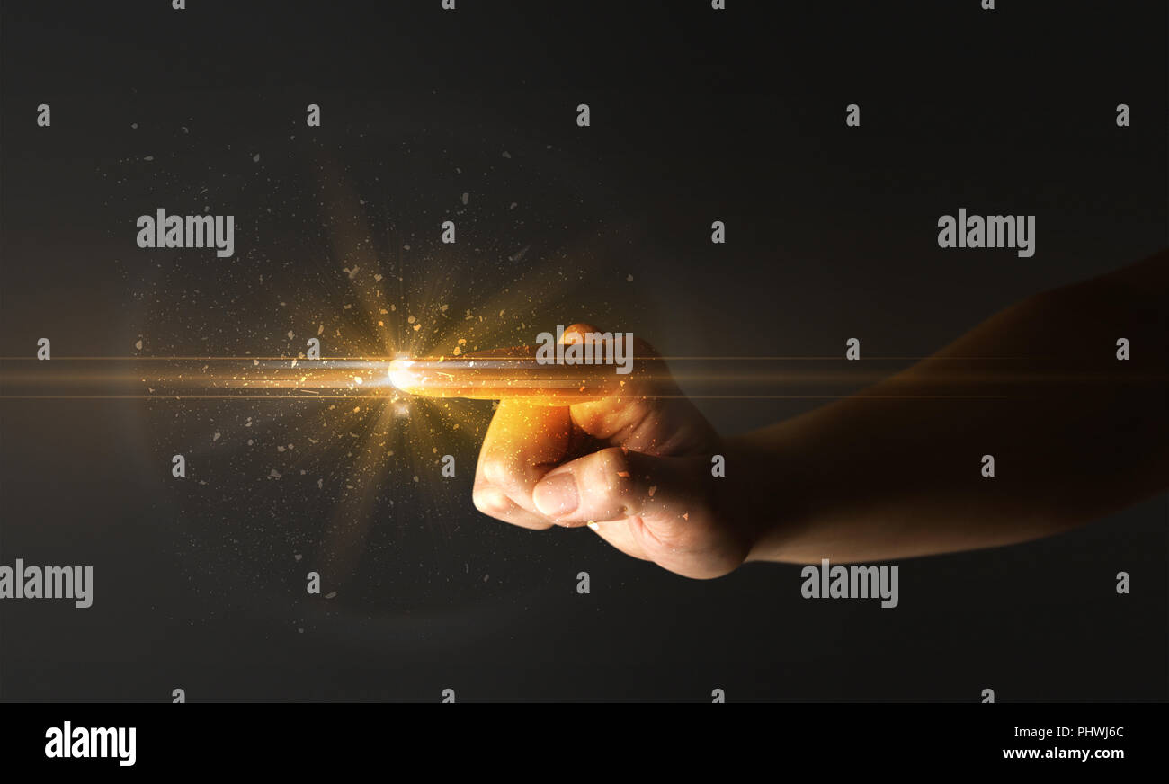 Female finger touching a beam of light Stock Photo - Alamy