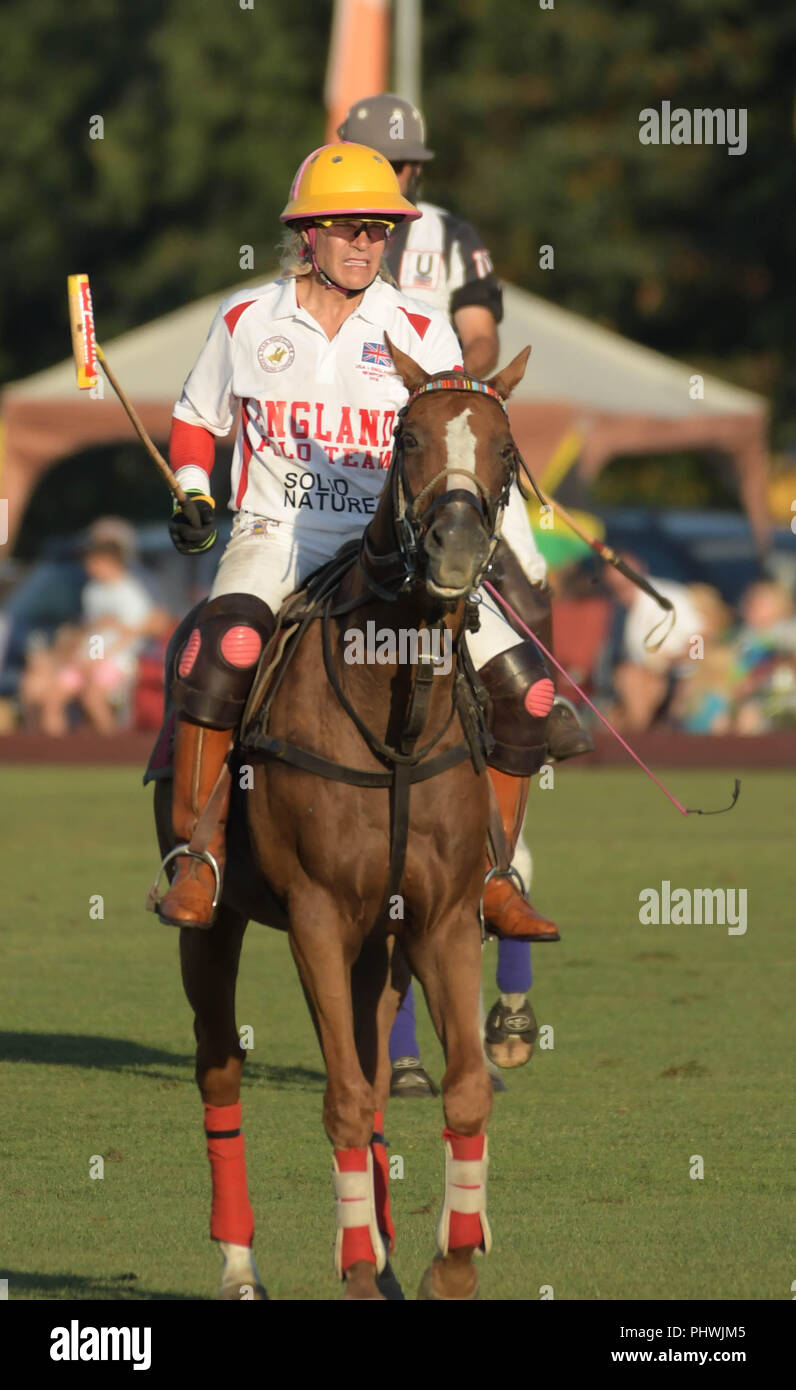 Polo player Garrie Renucci takes a breather during the annual England ...