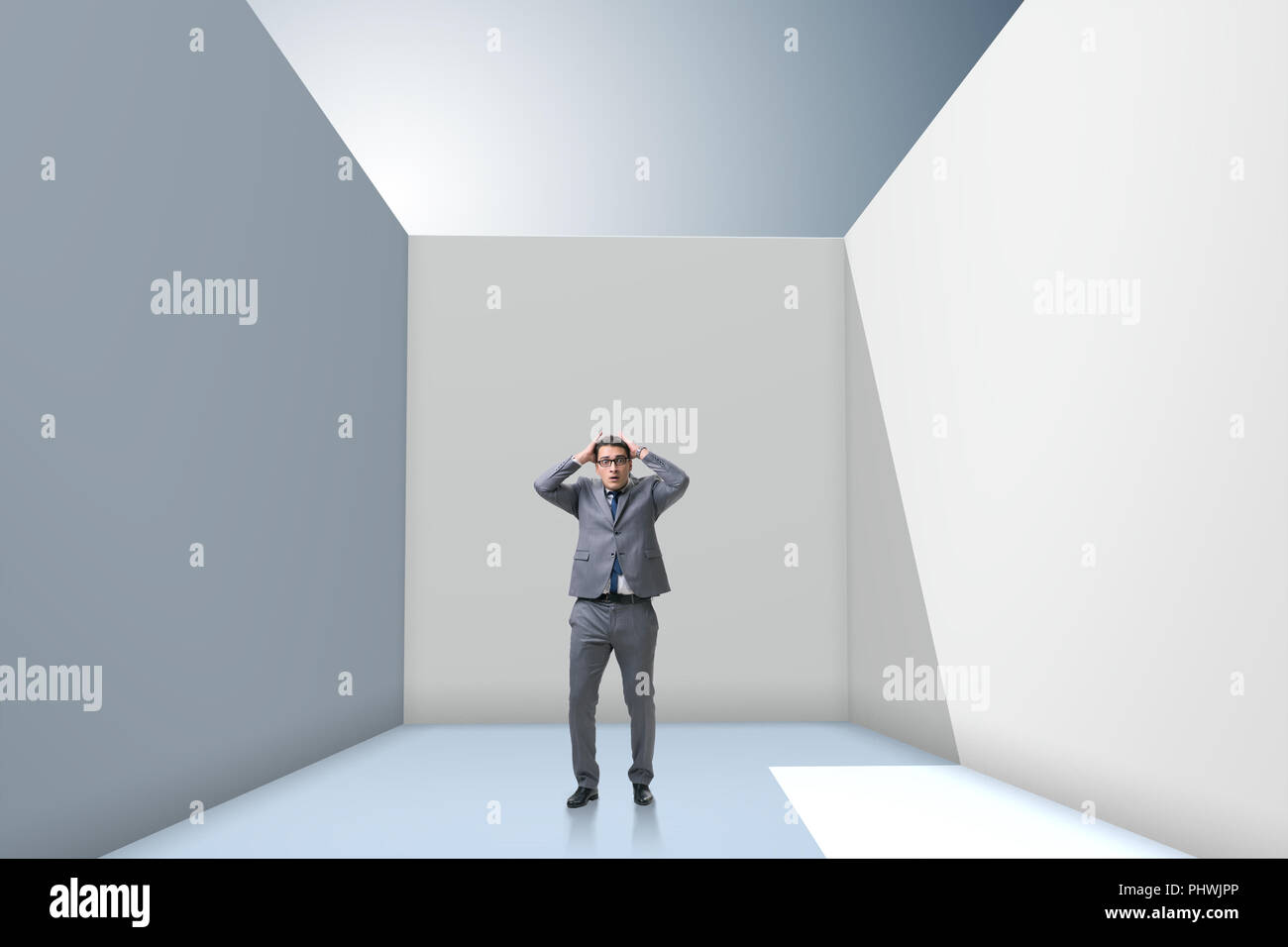 Businessman trying to escape from difficult situation Stock Photo - Alamy